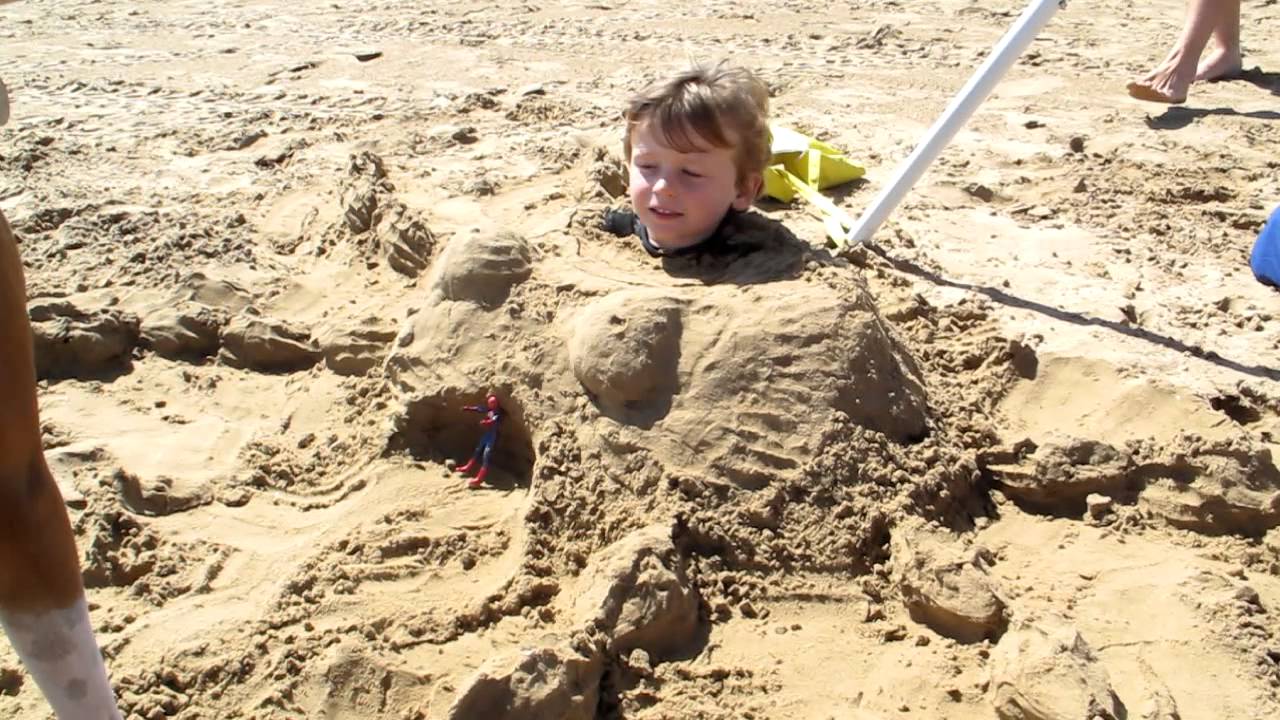declan buried in the sand 8-12 - YouTube