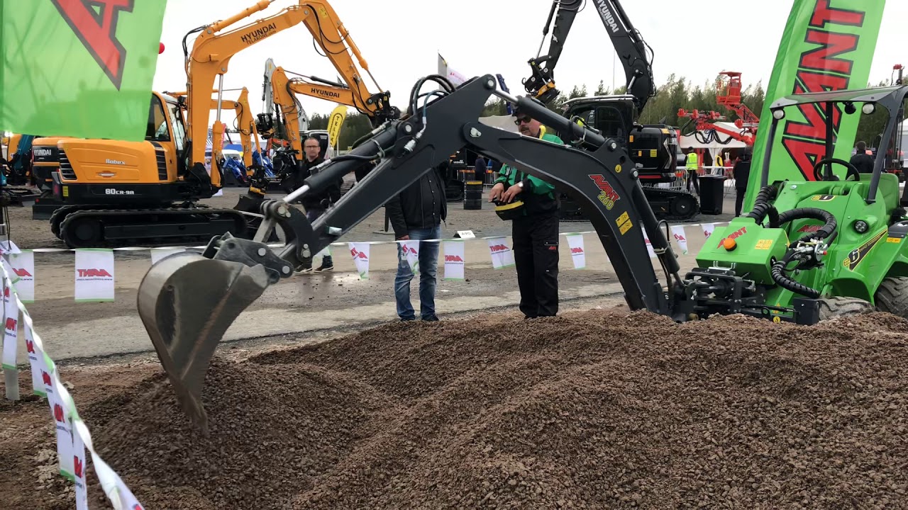 Avant e6 electric powered compact loader with remote controlled backhoe ...