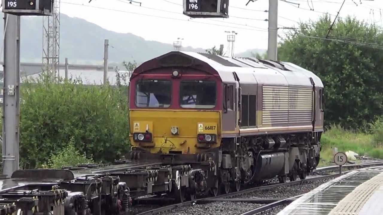 EWS (today DB Schenker) freight train pulled by Class 66 in Warrington ...