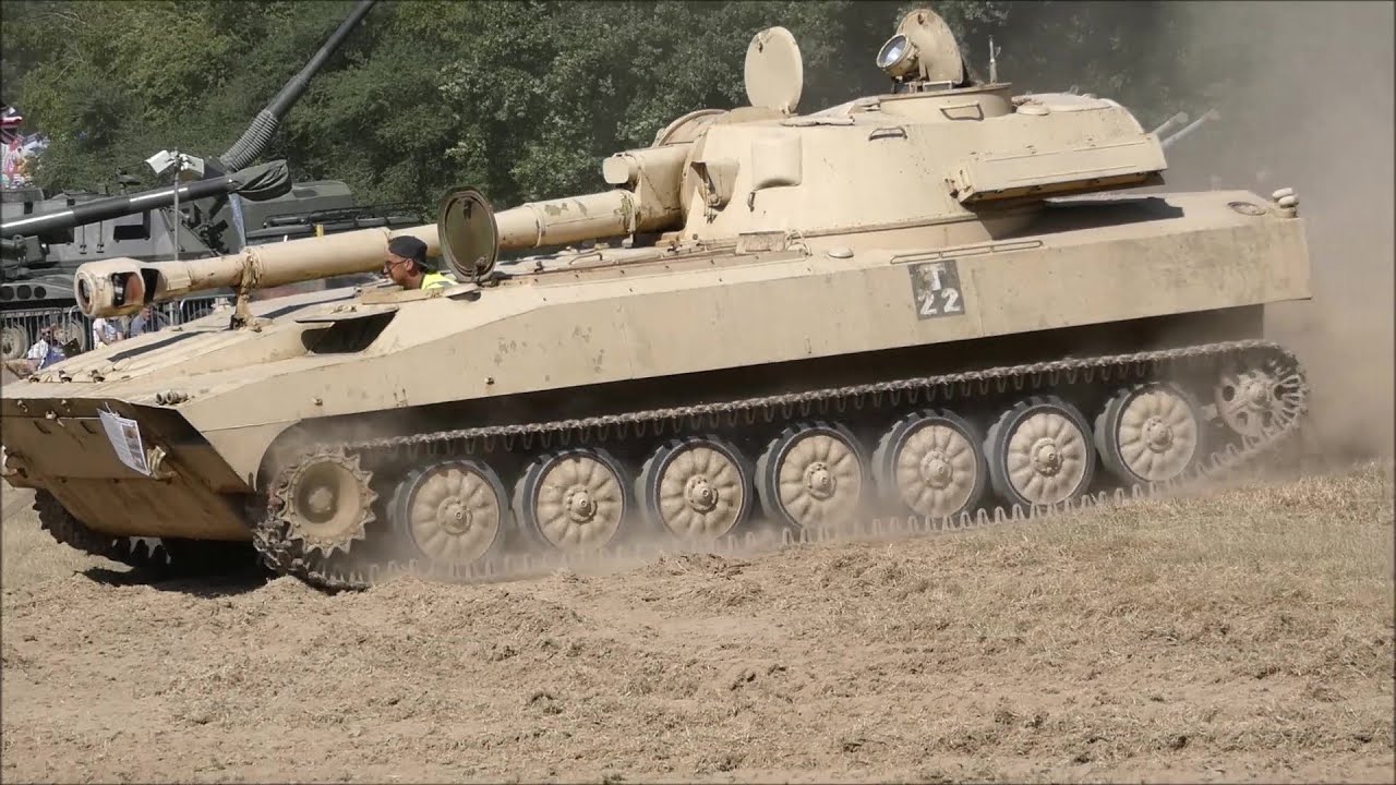 2S1 Gvozdika 122 mm Self-Propelled Howitzer, running in the dust, at ...