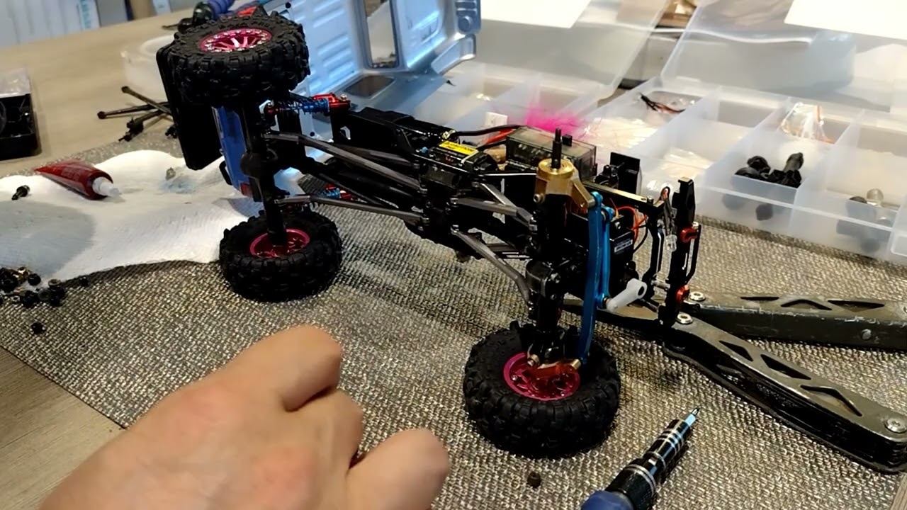 Replacing front outer axle shaft on an Axial SCX24 - YouTube