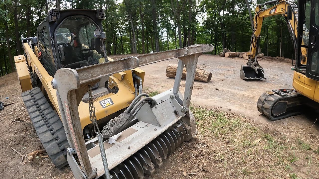 Mulching and a small excavation job - YouTube