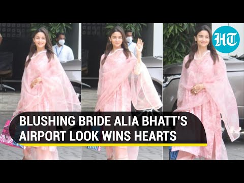 Alia's pink suit at airport wins hearts; First public appearance post wedding with Ranbir