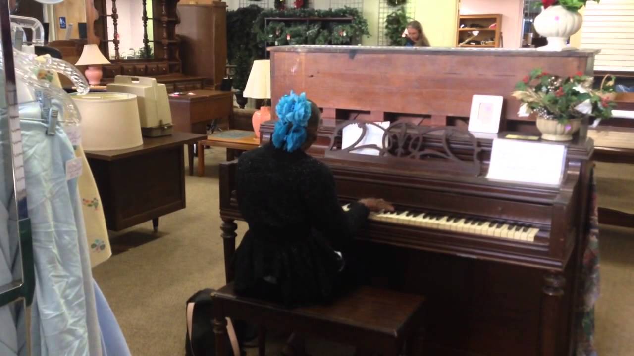 Amazing singer on a thrift store piano - YouTube