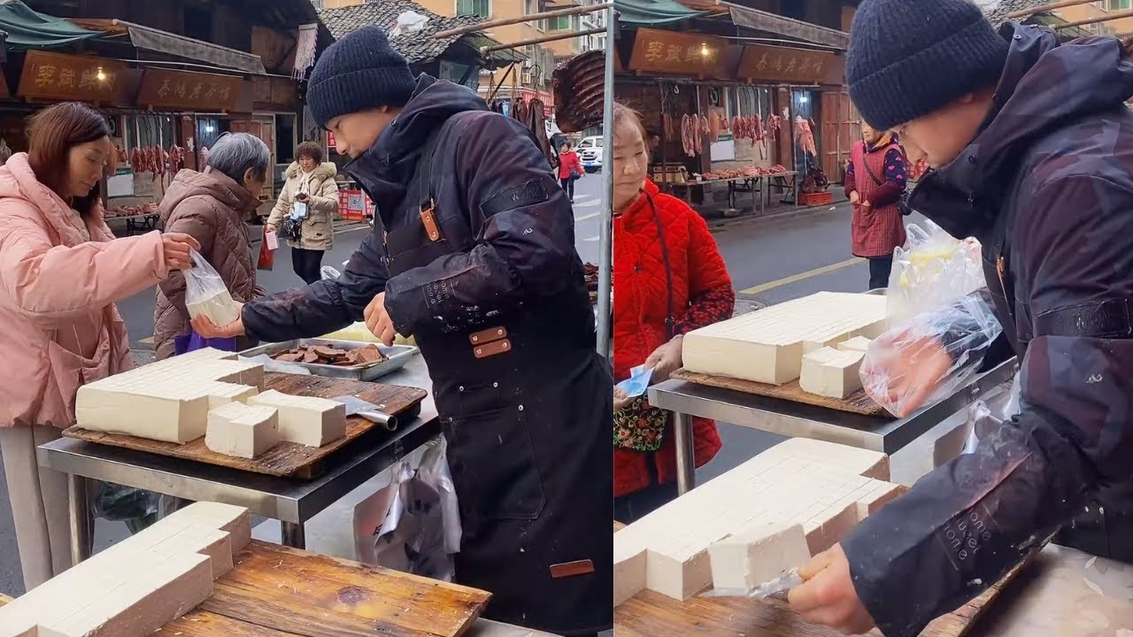 The stall sells tofu, which is freshly made and sold on February 5st ...