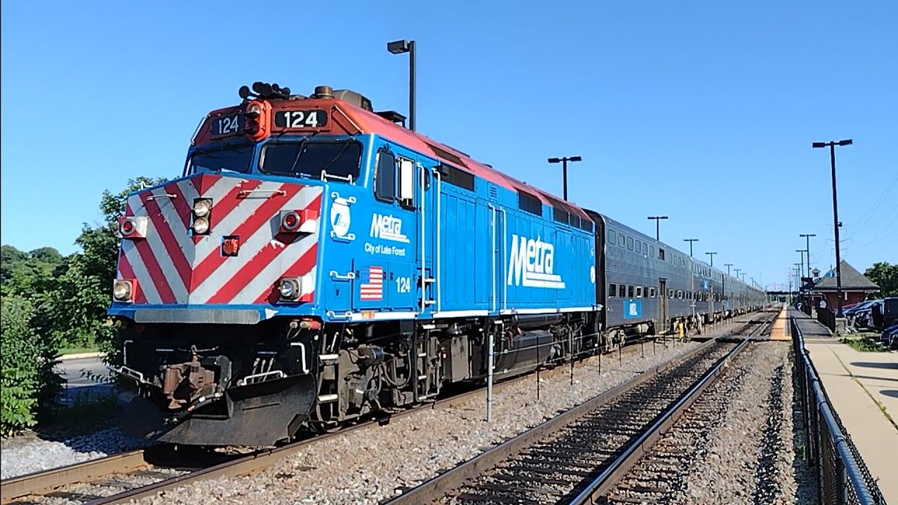 Metra F40PH-3 124 west at National St. in Elgin, Illinois on August 2 ...