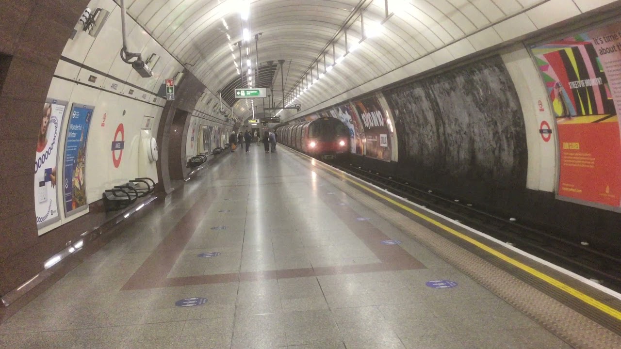 Northern line arriving at angel - YouTube