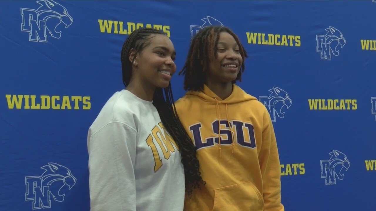Two Davenport North Lady Wildcats sign with Division I teams - YouTube