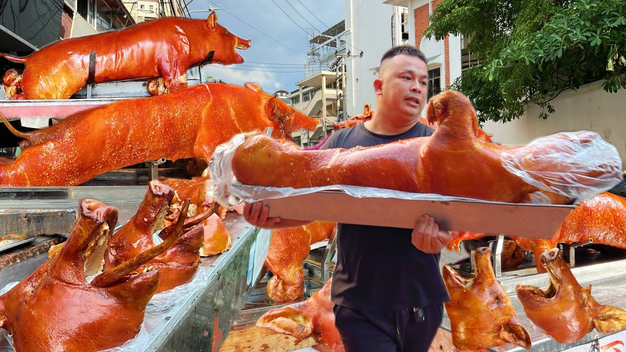 The man selling roasted pigs has extraordinary strength He can carry an ...