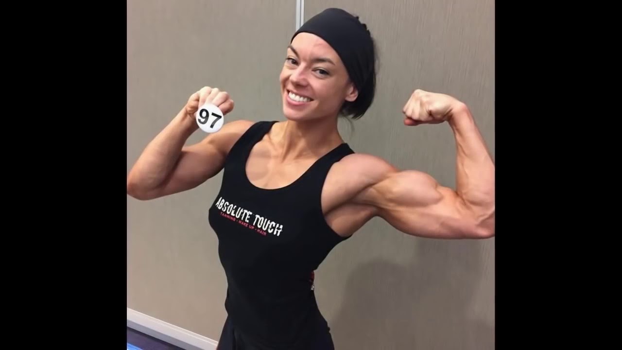 IFBB Champion Female Bodybuilder Jodi Boam flexing muscles and working ...
