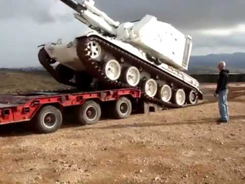 Tank Falls off the Truck - YouTube