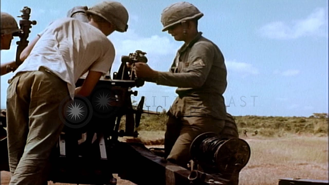 Soldiers of the U.S. 2nd Battalion, 117th Artillery fire the M101 ...