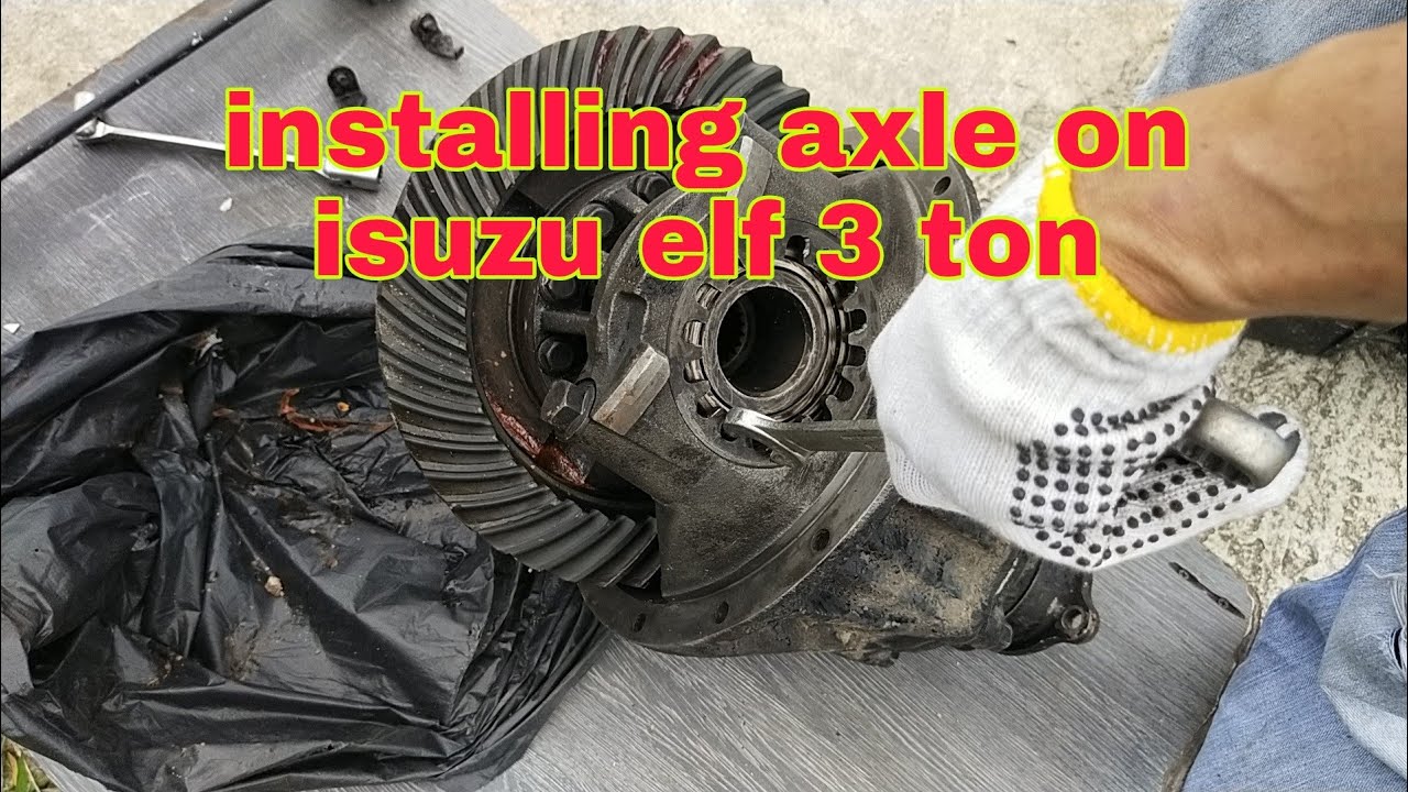 installing axle on isuzu elf 3 ton - YouTube