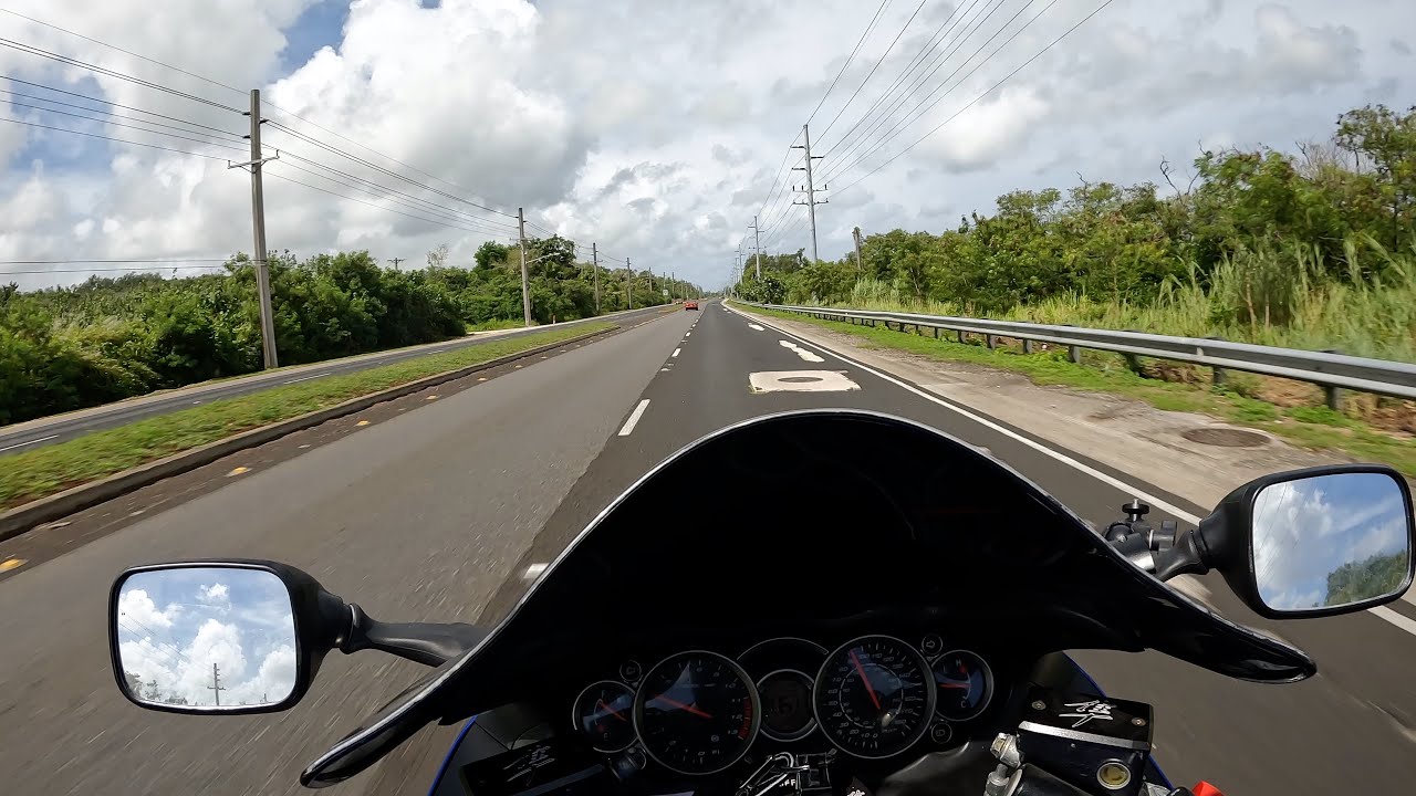 Dodging potholes in Guam - YouTube