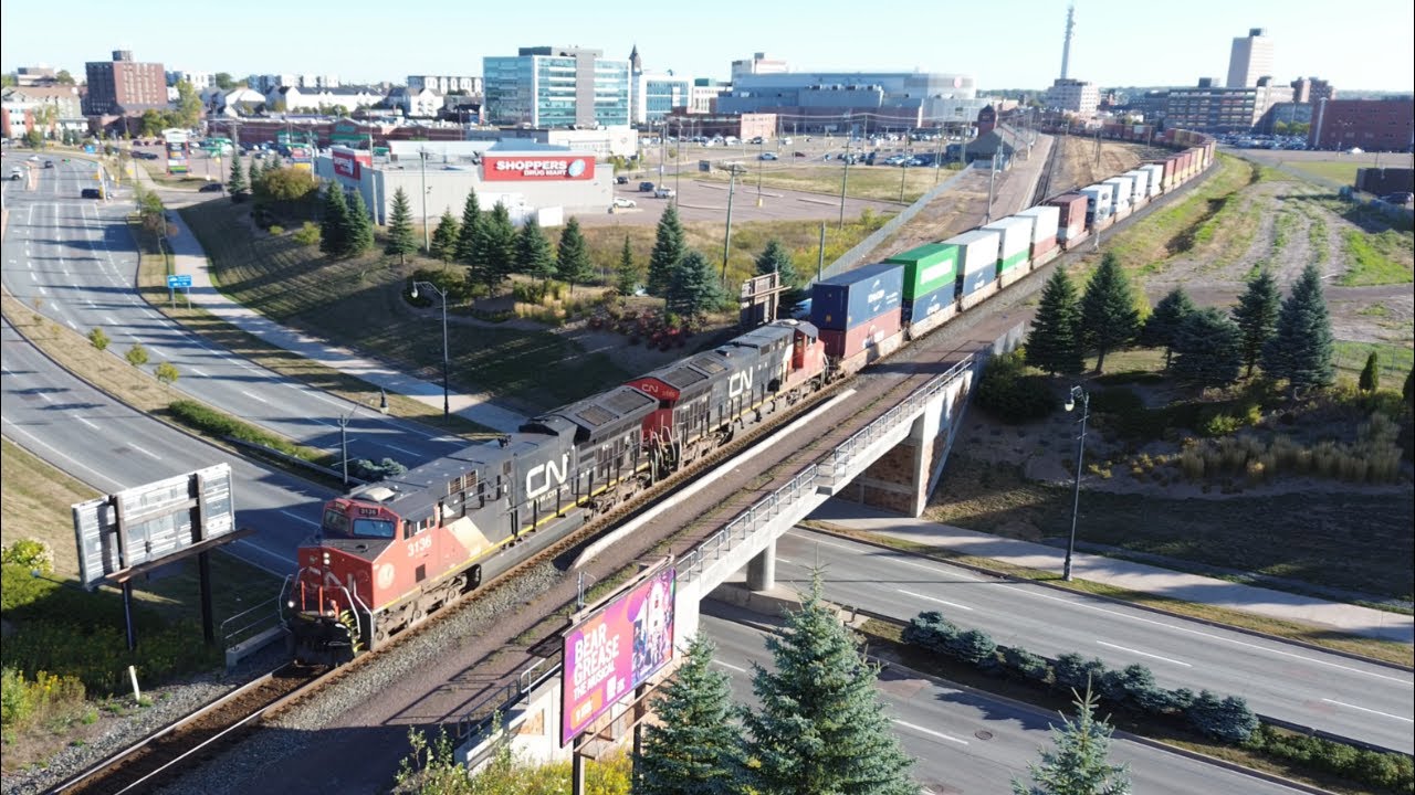 Awesome Aerial 4K View! Long Extra Stack Train CN X121 passing thru ...