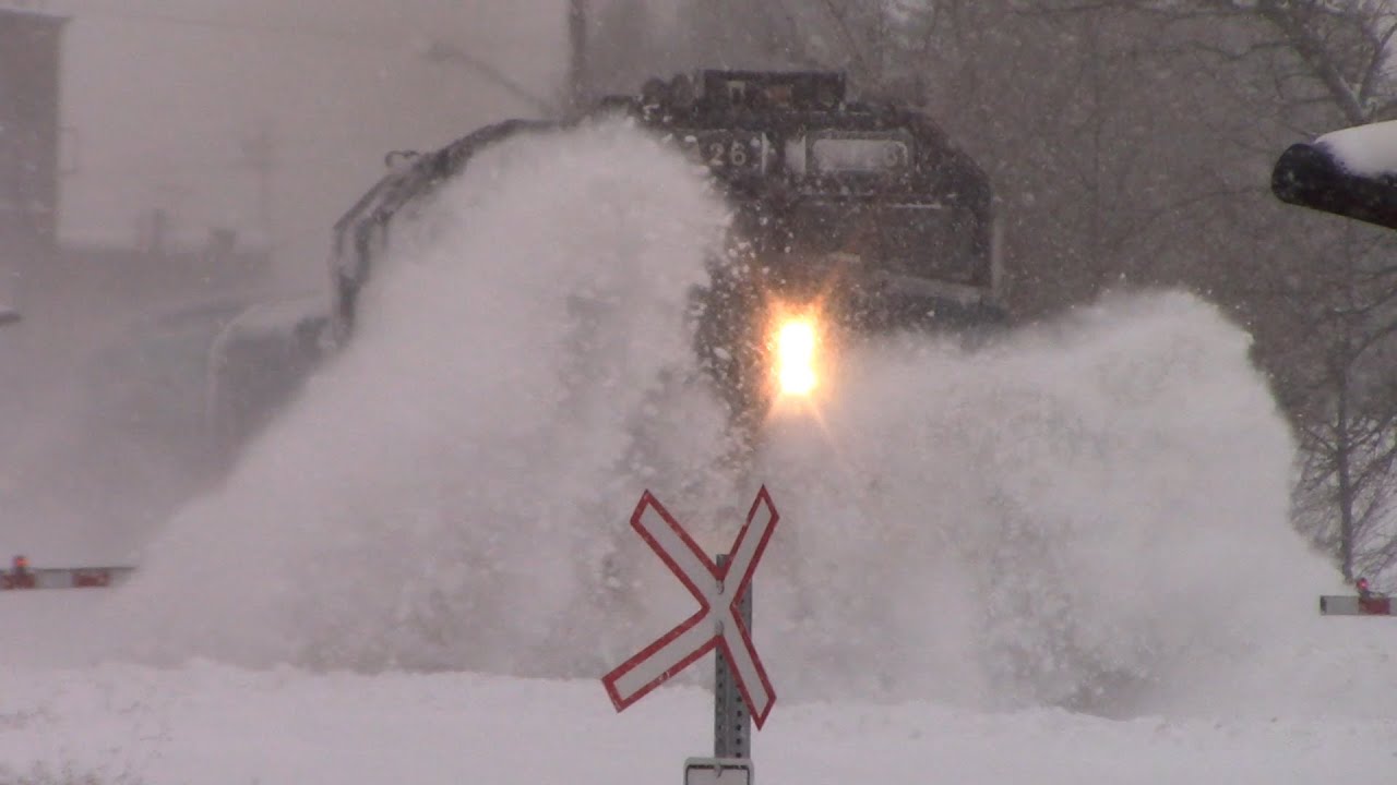 Awesome Snow Bank Busting Action! VIA Rail Trian 14 - The Ocean Passing thru Downtown Moncton ...