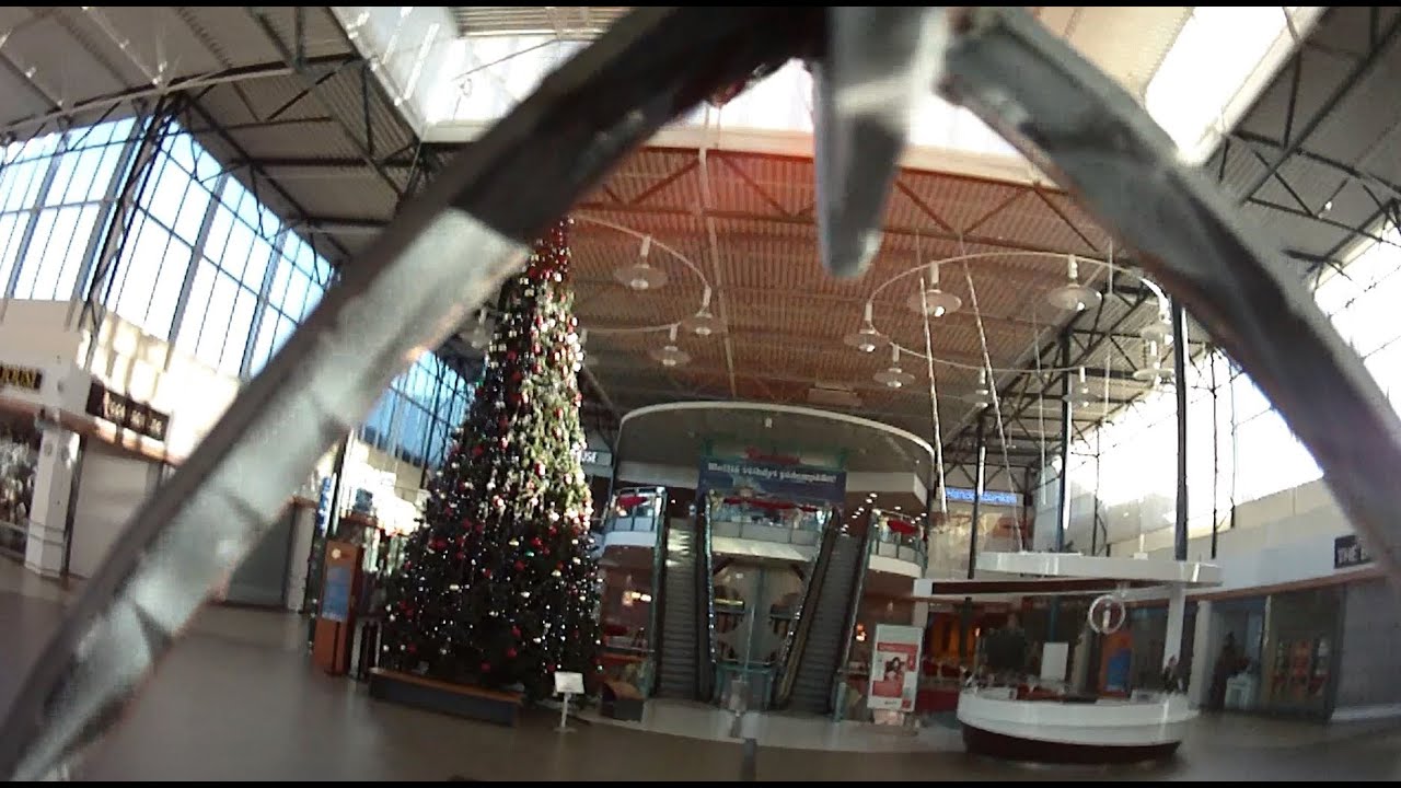 Plane flying inside shopping center! - YouTube