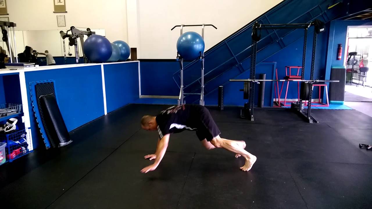 Push-Up to a Sit-Out with a Leg-Swing - YouTube