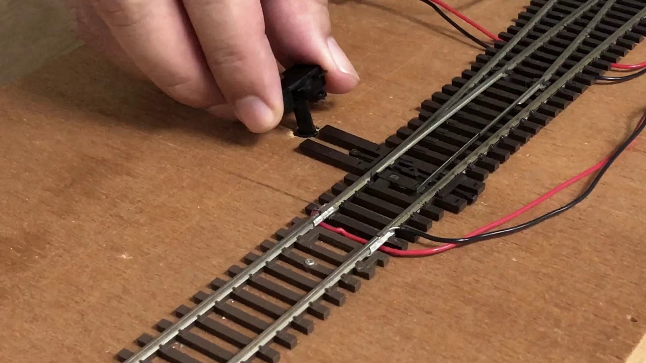 AP022 servo motor link install underneath hte turnout - YouTube