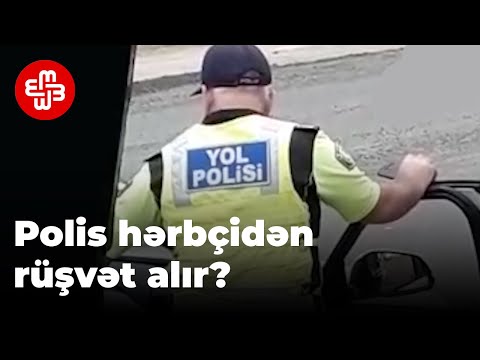 Hərbiçi polis maşınında: suallar yaradan növbəti video