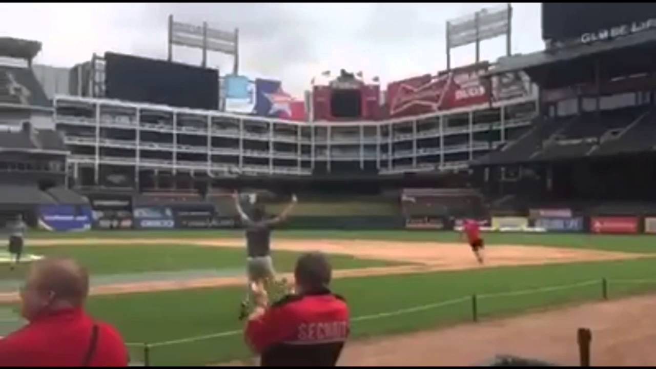 Texas Rangers fan hits home run, wins seats - YouTube