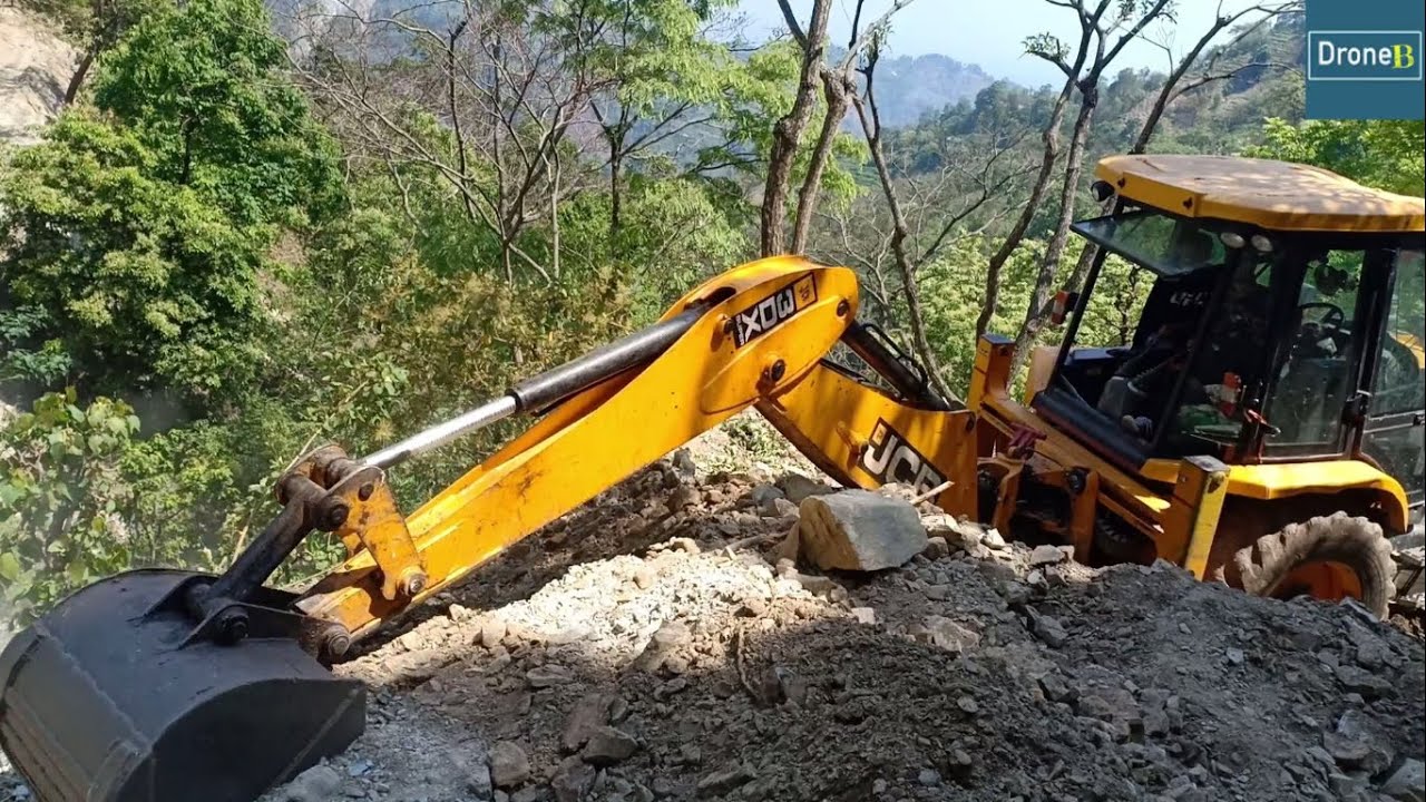 Hilly Narrow Rough Road-Backhoe Loader-Cutting Hill-Clearing Dirt - YouTube