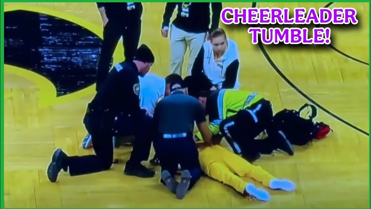 Iowa cheerleader injured after nasty FALL during Minnesota men's ...
