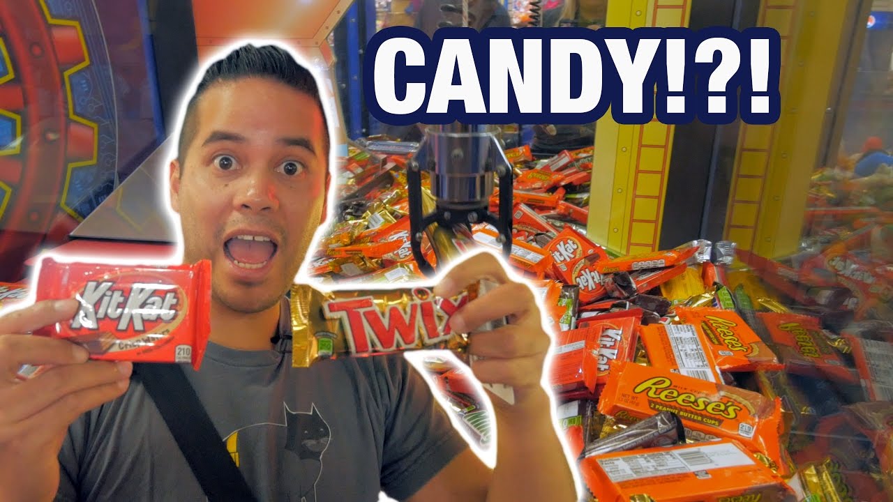 Sweet candy claw machine wins at Boomers! | The Crane Couple - YouTube