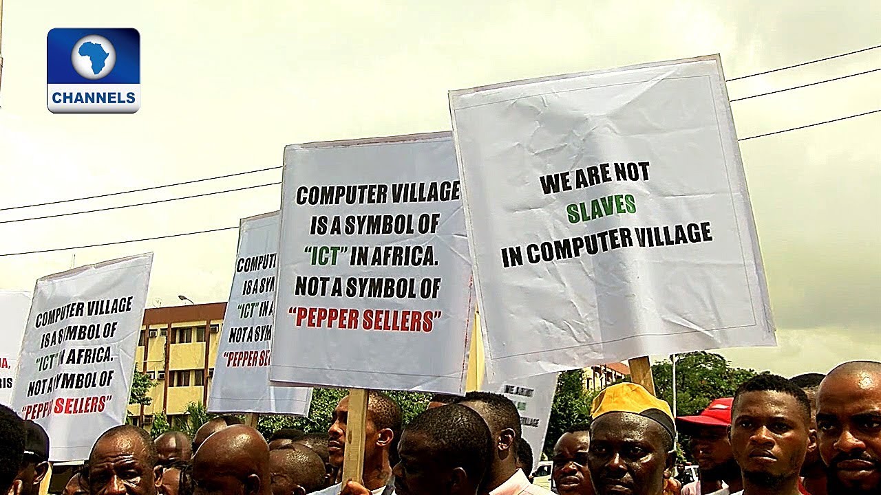 Traders Shut Down Computer Village Over Plan To Install 'Iyaloja' - YouTube
