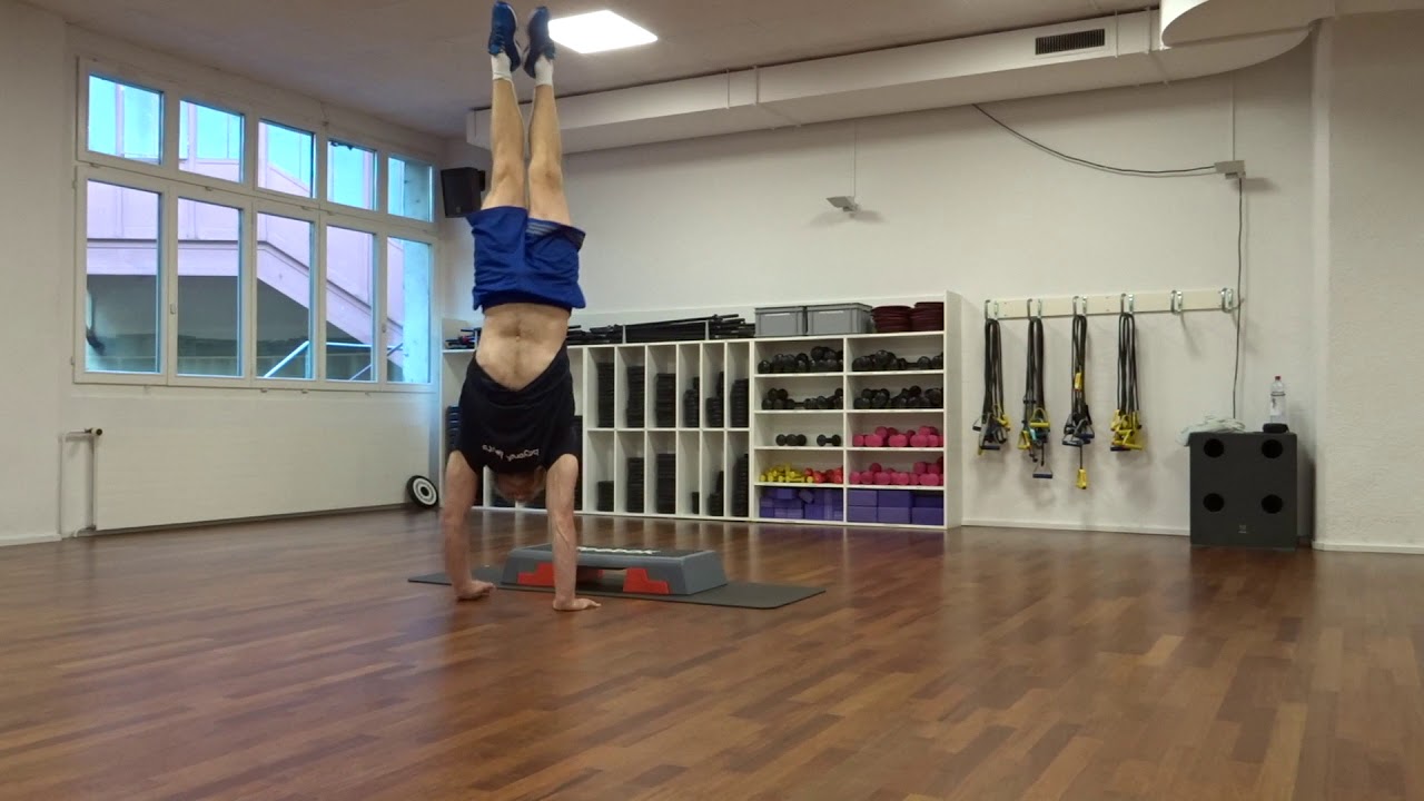 Handstand step back half turn back - YouTube