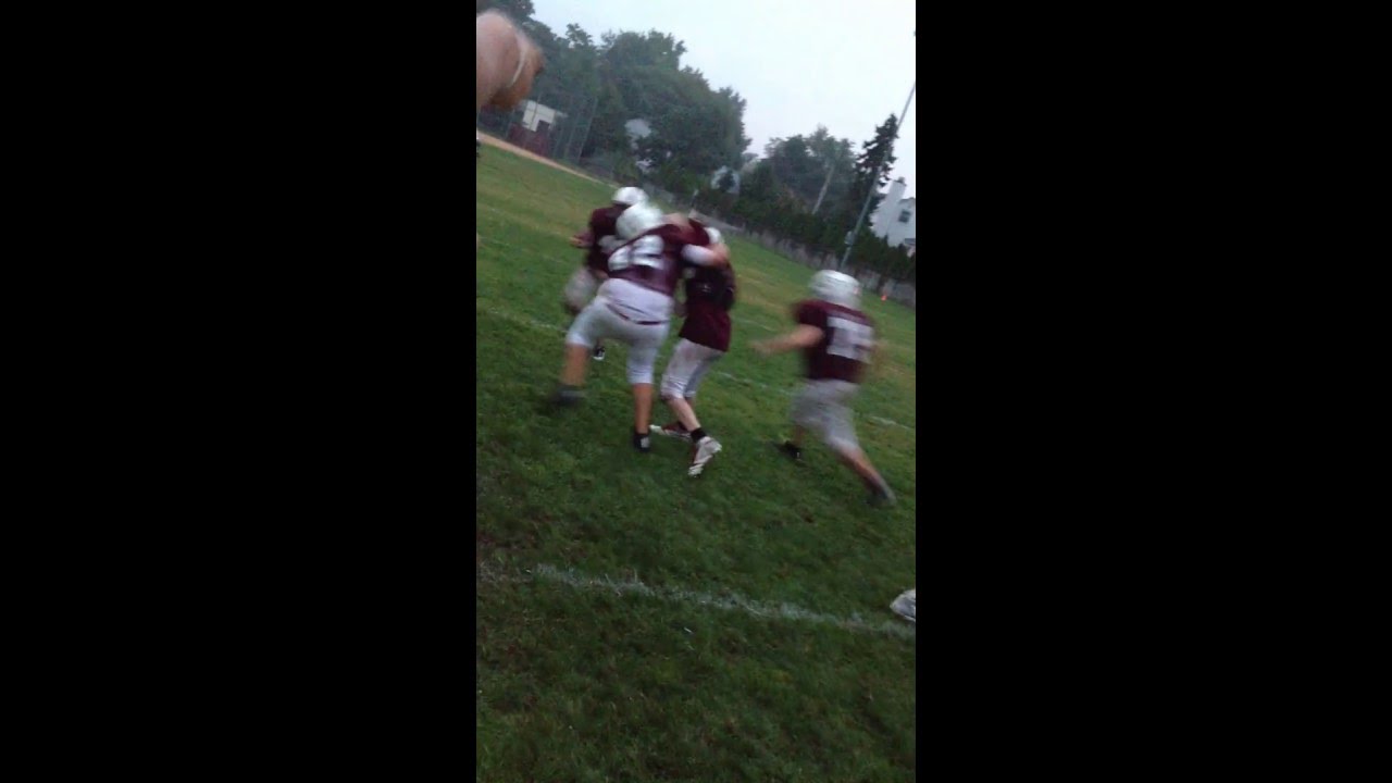 Kid takes down his school bully in football practice - YouTube