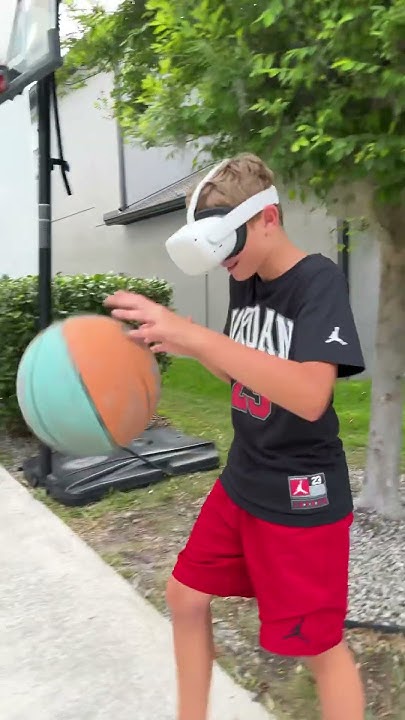 Shooting into the basketball hoop with a VR headset on - YouTube