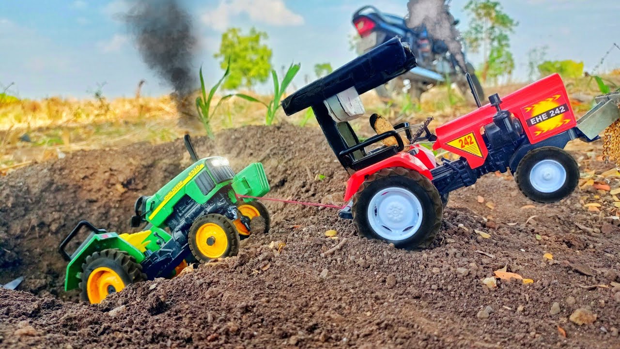 John Deere Tractor upset down and EICHER with Double E Tractor Rescue ...