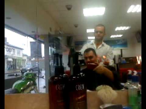 Turkish barber burning my ear hair out during haircut! - YouTube