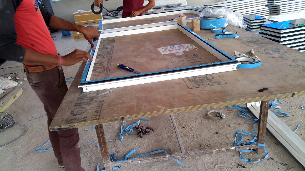 Pressure tape fixing on subframe of glass glazing - YouTube