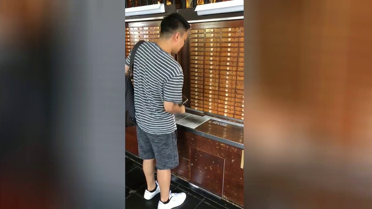Filipino Tourist Using Omikuji Japanese fortune sticks in a Japan - YouTube