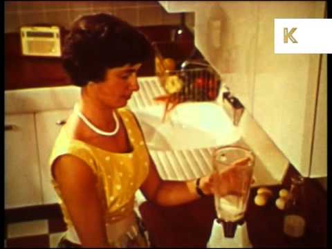 Late 1950s/ Early 1960s Housewife Cooking in Kitchen, Colour Archive ...
