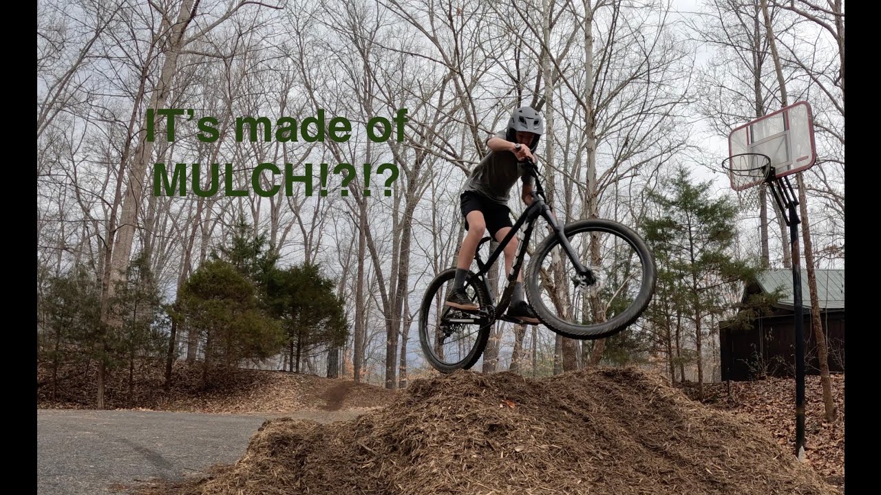 Riding a Mulch Jump!! - YouTube