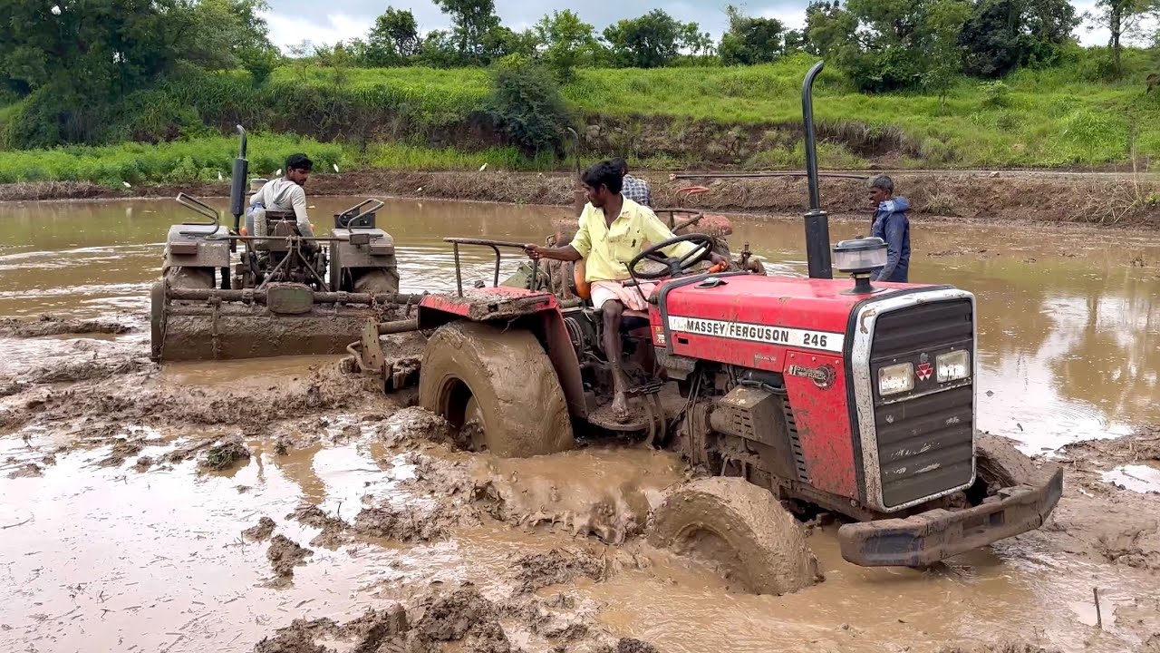 Massey ferguson 4wd tractor stuck in mud pulling out by Eicher and ...