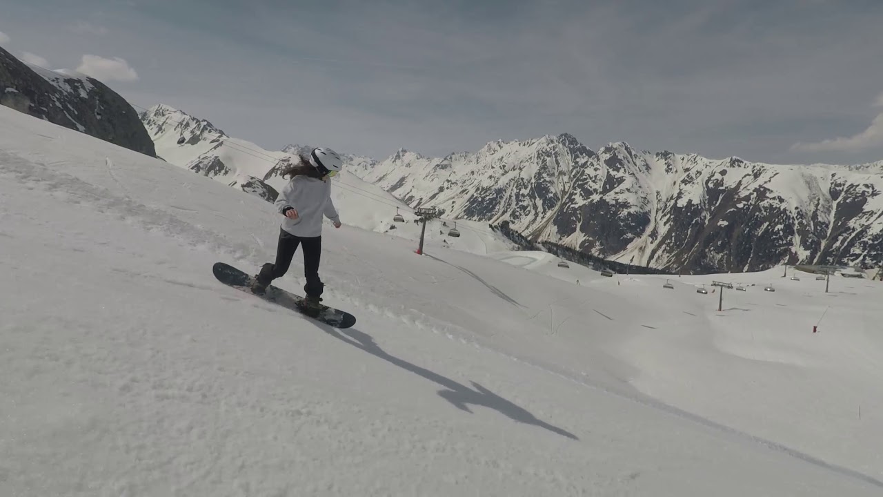 Snowboarding cruising a red slope in short turns - YouTube