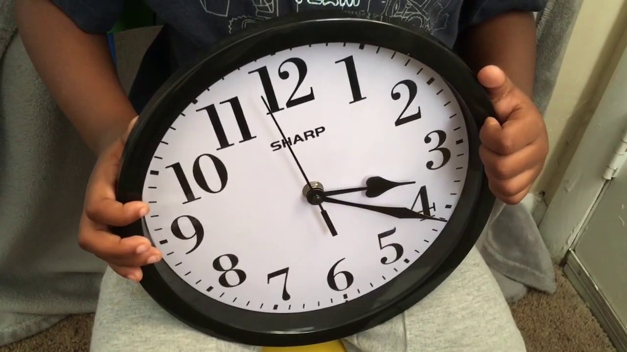 3-year-old telling time - YouTube