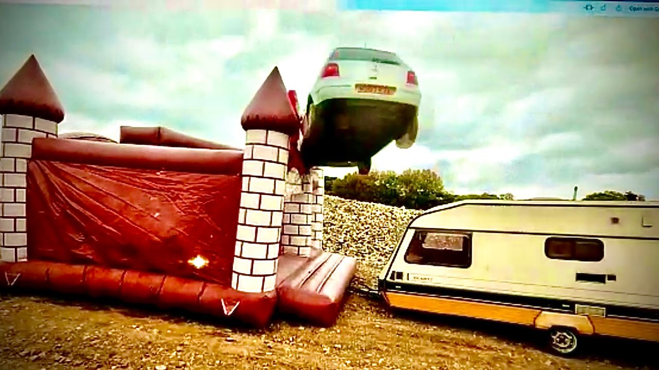 The lazy car dealer caravan/bouncy castle car jump competition big ramp ...