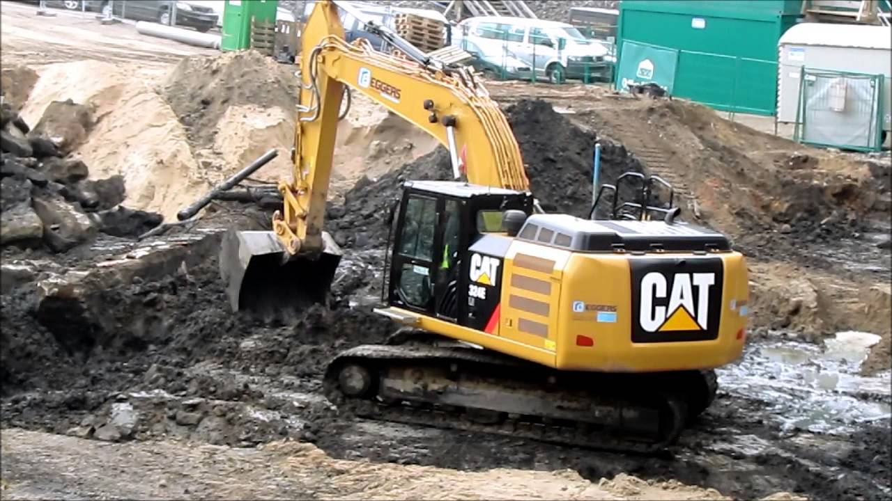 Bagger CATERPILLAR 324E - YouTube