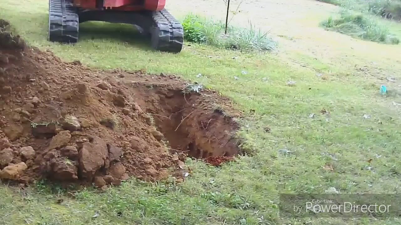 Soil testing digs for septic design - YouTube