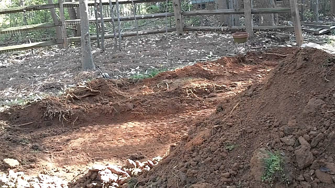 Moving Dirt....with a Mini Skid Steer - YouTube