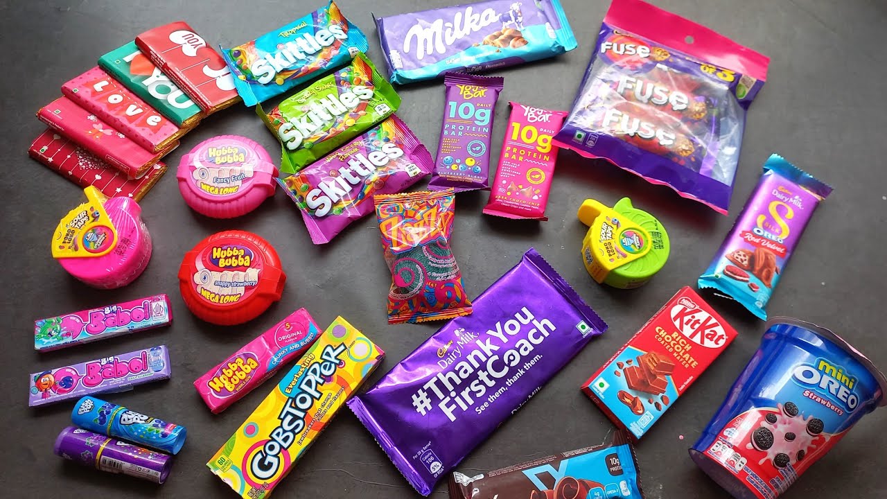 Lots of candies, surprise toys, chocolate opening video, lots of ...