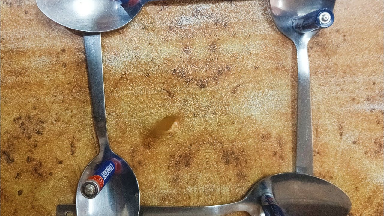 Making coin spin using spoon and battery - YouTube