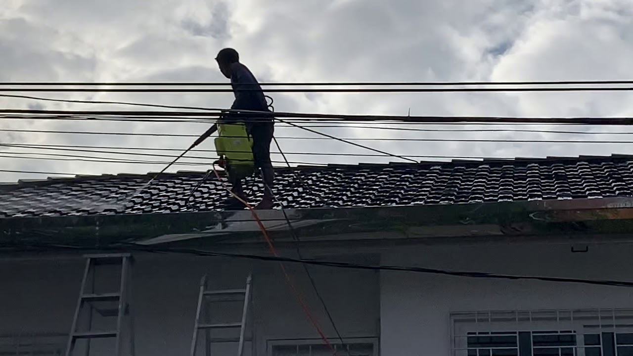 Cleaning of ashfall on the roof was not really easy. - YouTube