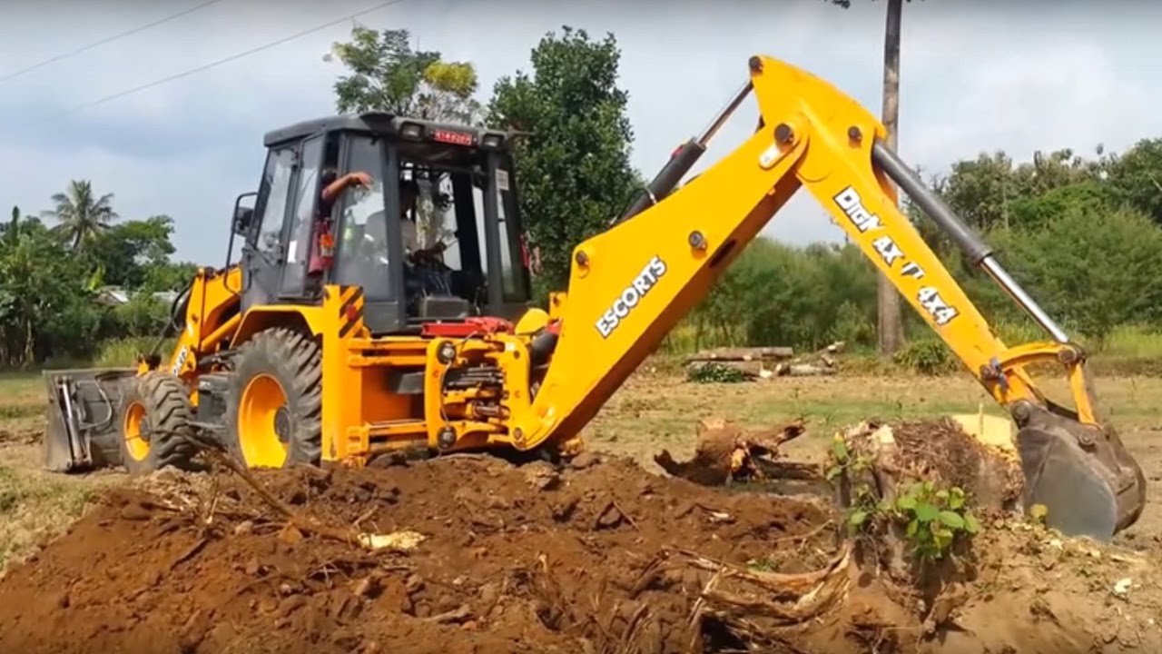 Lazy Driver in Escorts Dozer - Dozer Pulling Tree Root on Road ...