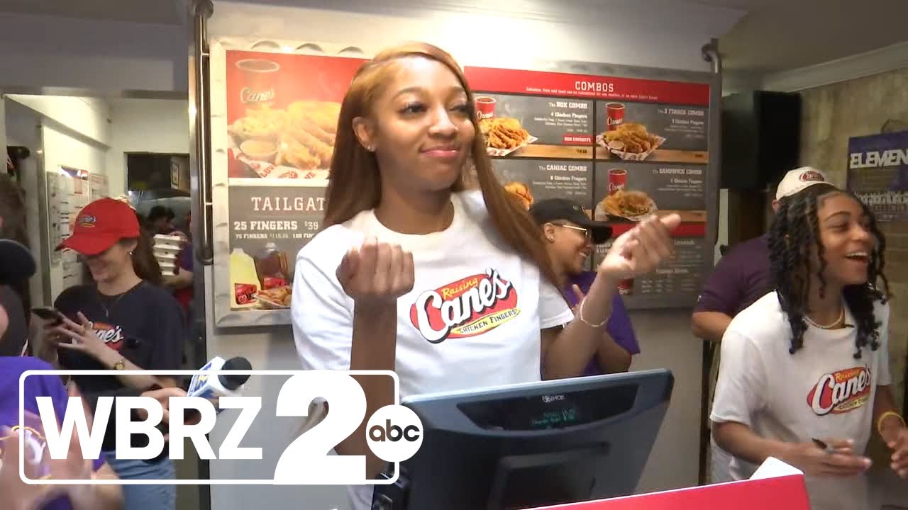 Best moments - LSU basketball stars work a Raising Cane's drive thru ...
